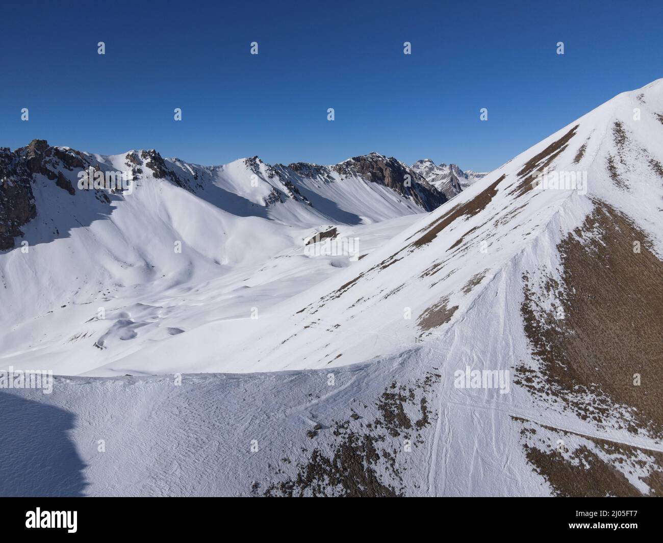 Beautiful view of a mountainous winter landscape with the Alps covered ...