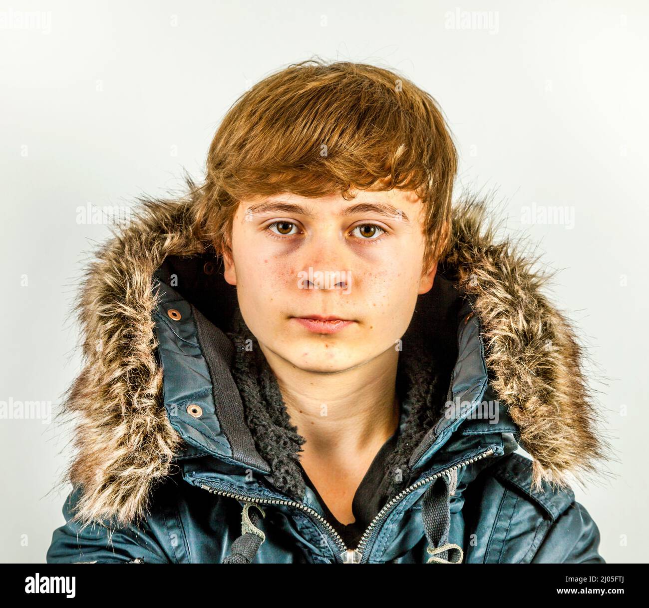 portrait of freezing boy in winter clothes Stock Photo - Alamy
