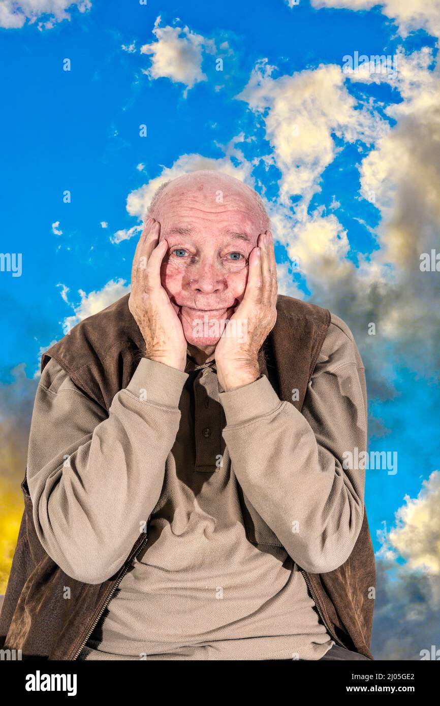 portrait of elderly funny retired man with sky background Stock Photo ...