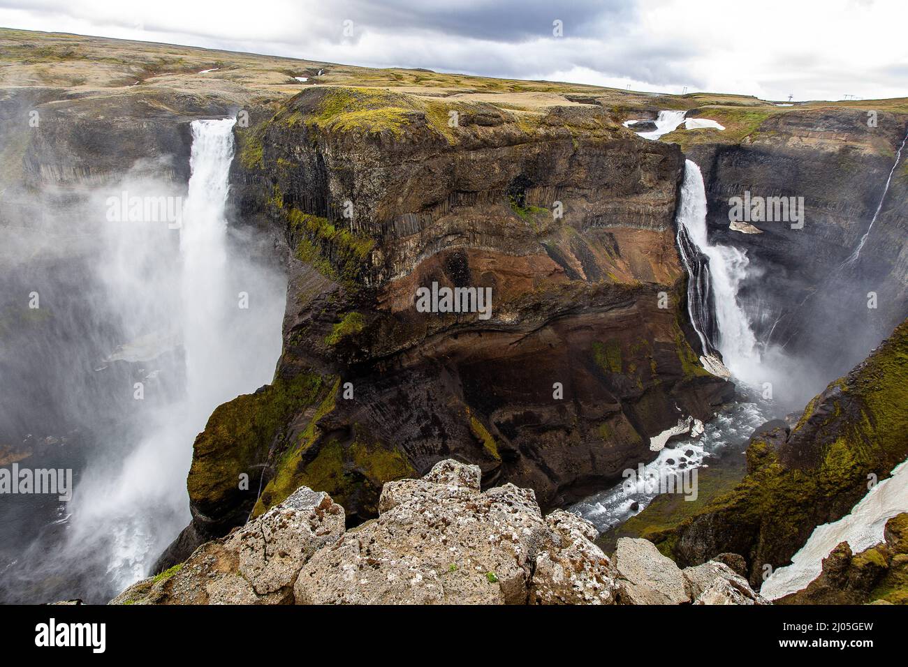 View from the edge of a cliff and an opening scene of waterfalls and ...