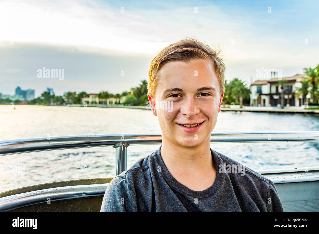 portrait of cute friendly boy on a boat Stock Photo - Alamy