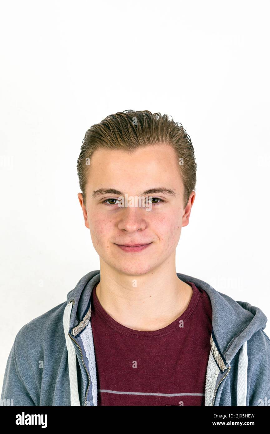 friendly looking teenage boy isolated on white Stock Photo - Alamy