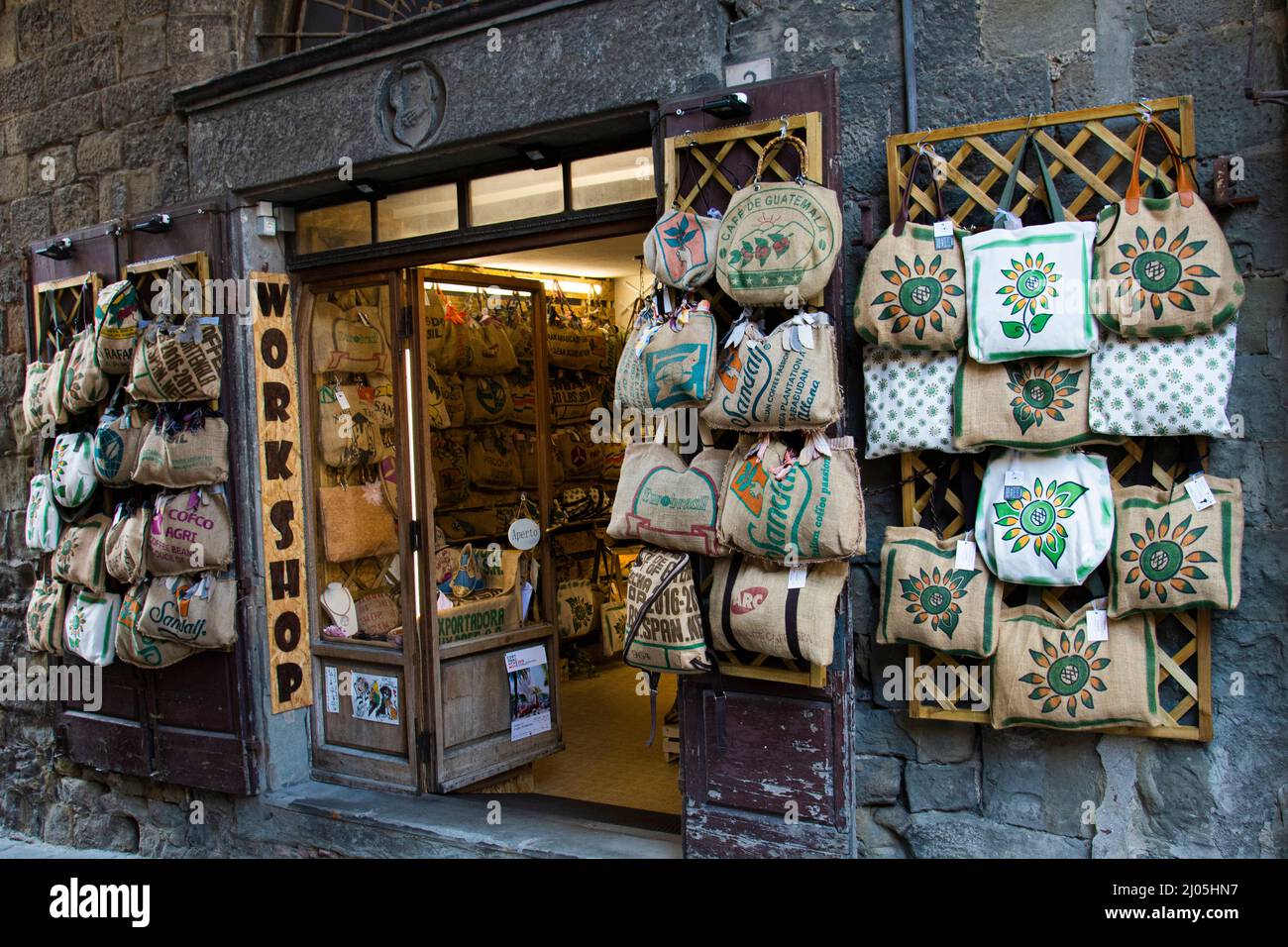 Storefront on a sidewalk in Roma, Italy Stock Photo - Alamy