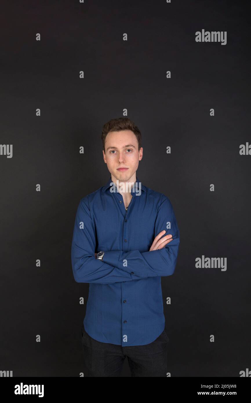 portrait of smart looking young man with white background Stock Photo ...