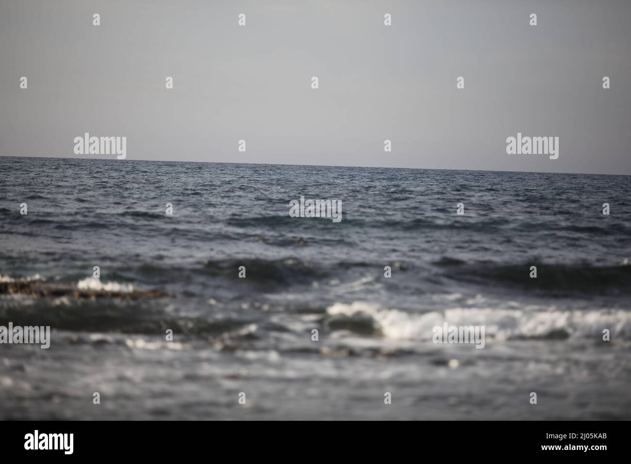 low waves on the shore of a beach High quality Stock Photo - Alamy