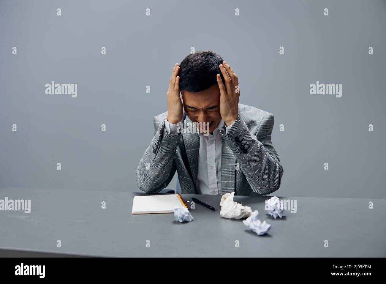 businessmen in a gray suit crumpled paper office official emotions ...