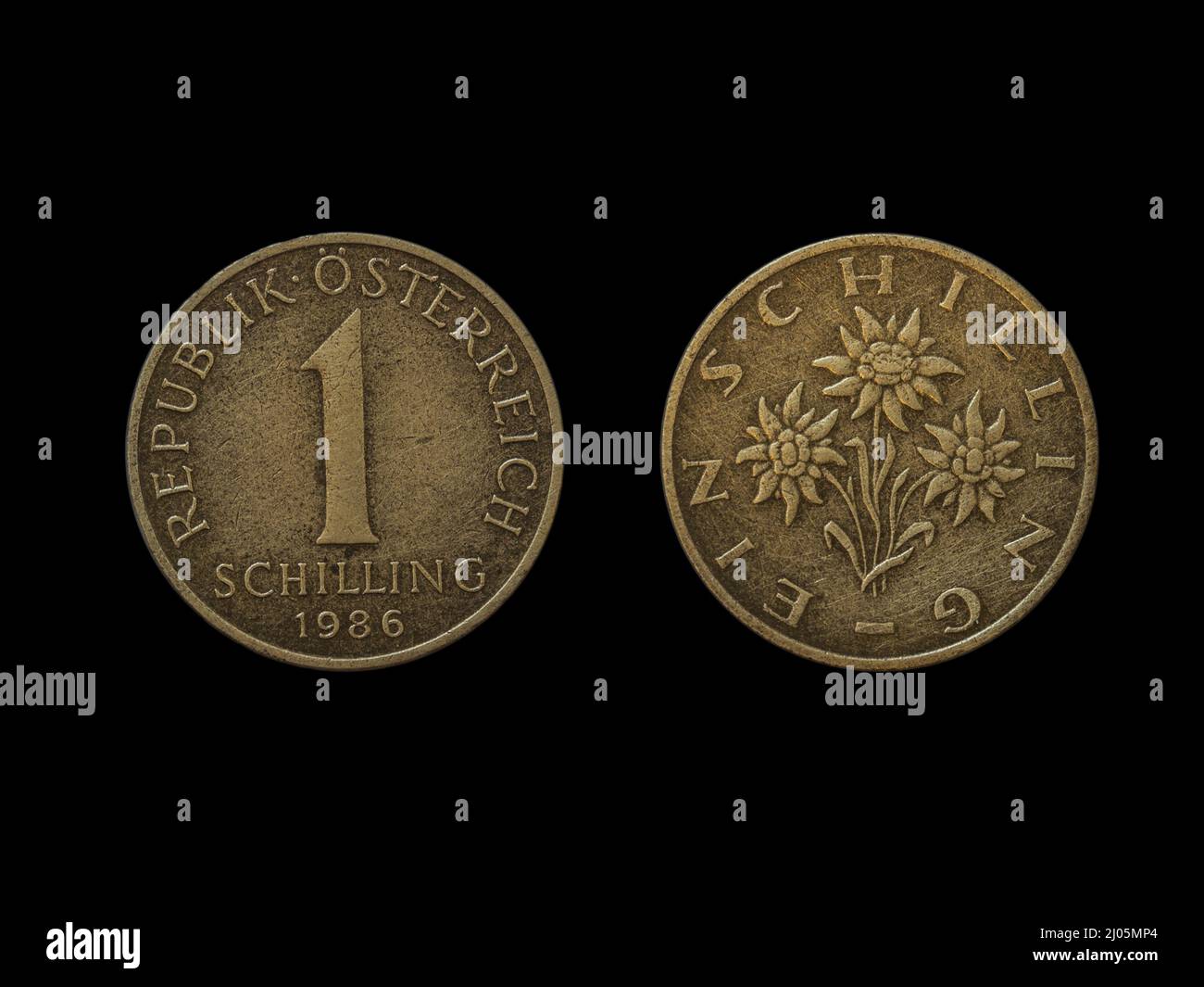 Closeup of an old Austrian coin (1 schilling) isolated on black ...