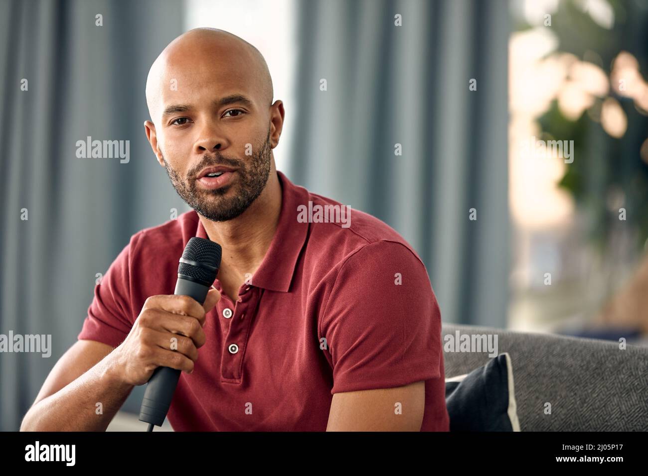 Man Speaking At Meeting
