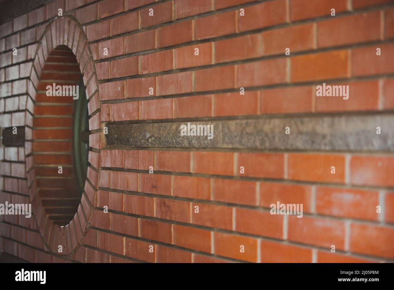 Closeup of a brick wall with a beautiful design Stock Photo - Alamy