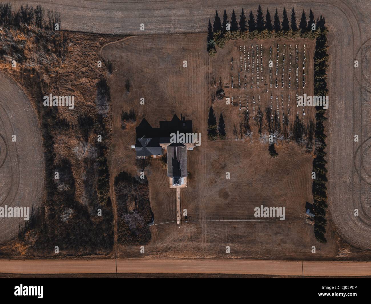 Top view of a church and a graveyard with large trees Stock Photo - Alamy