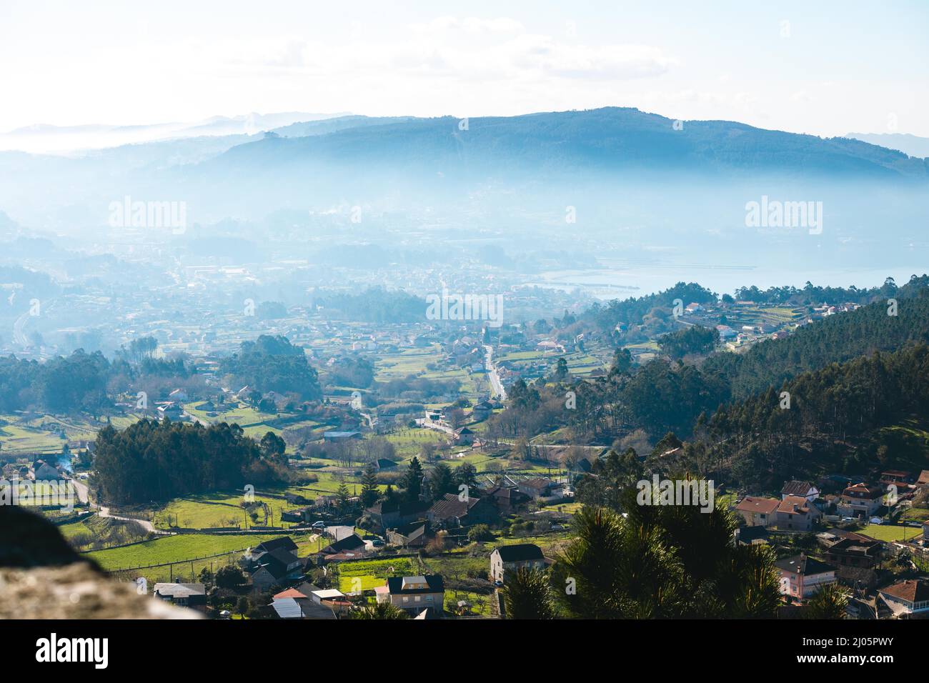 Aerial view of a beautiful landscape with buildings in Galicia, Spain ...