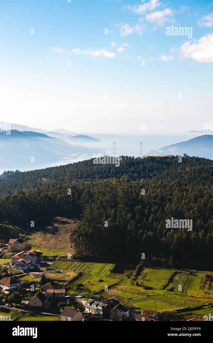 Aerial view of a beautiful landscape with buildings in Galicia, Spain ...