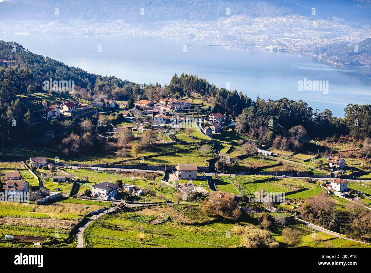 Aerial view of a beautiful landscape with buildings in Galicia, Spain ...