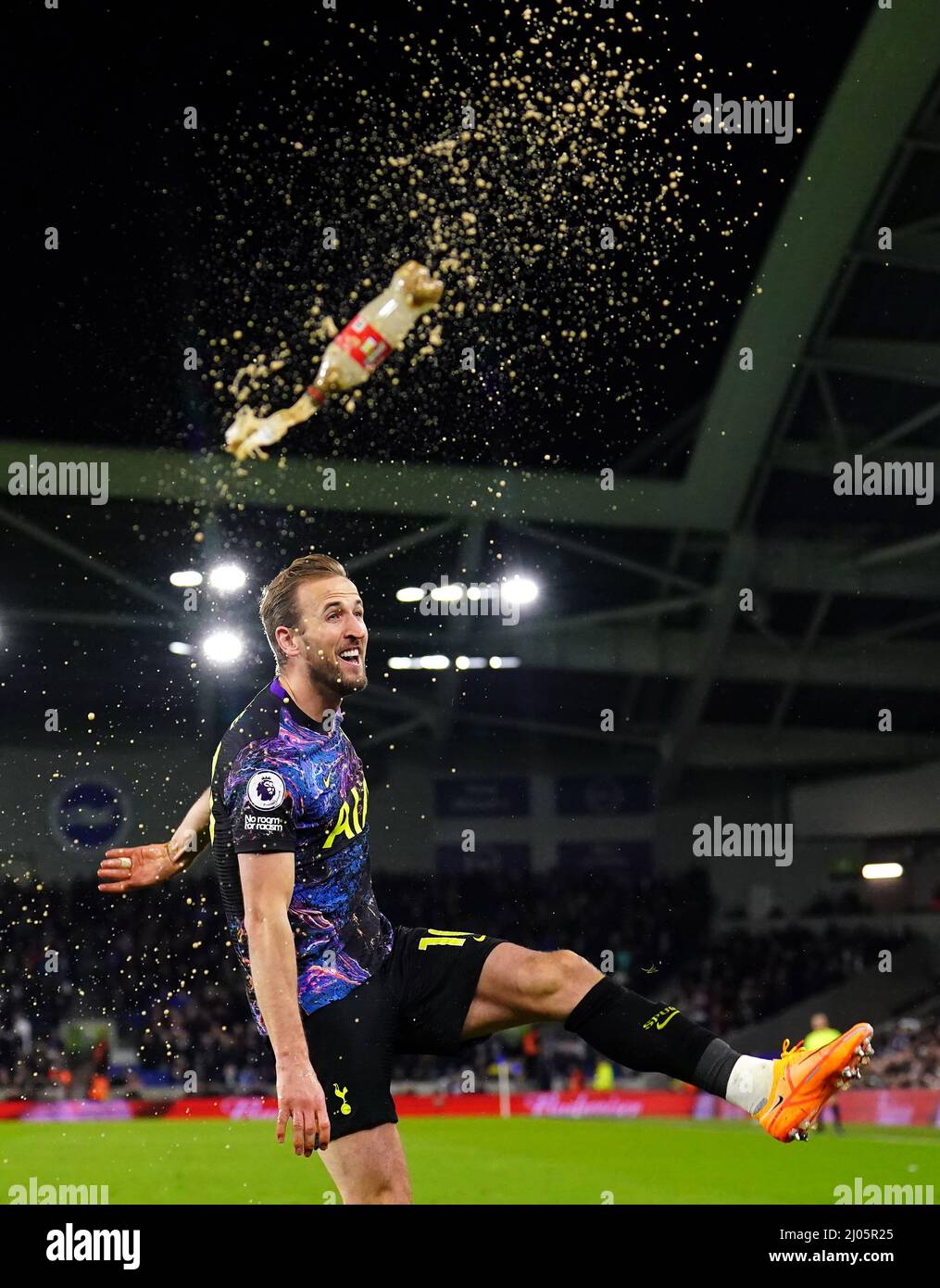A bottle of cola is thrown as Tottenham Hotspur's Harry Kane celebrates ...