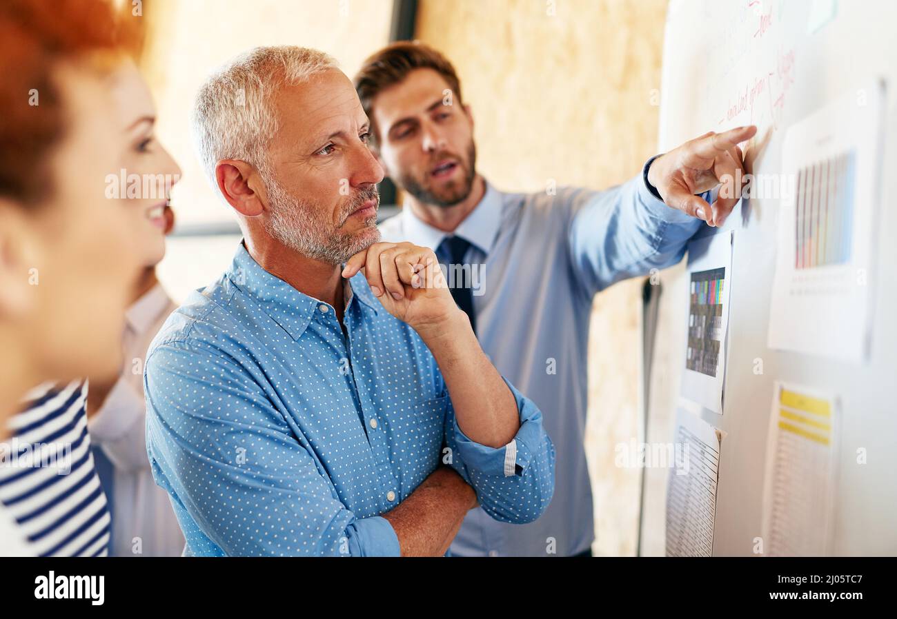 Businessman considering options hi-res stock photography and images - Alamy
