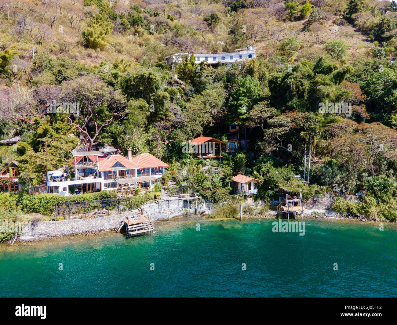 Aerial photograph of San Marcos la Laguna, Guatemala on a beautiful ...