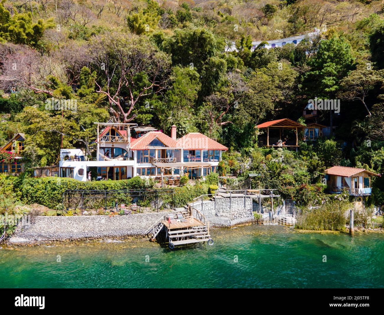 Aerial photograph of San Marcos la Laguna, Guatemala on a beautiful ...