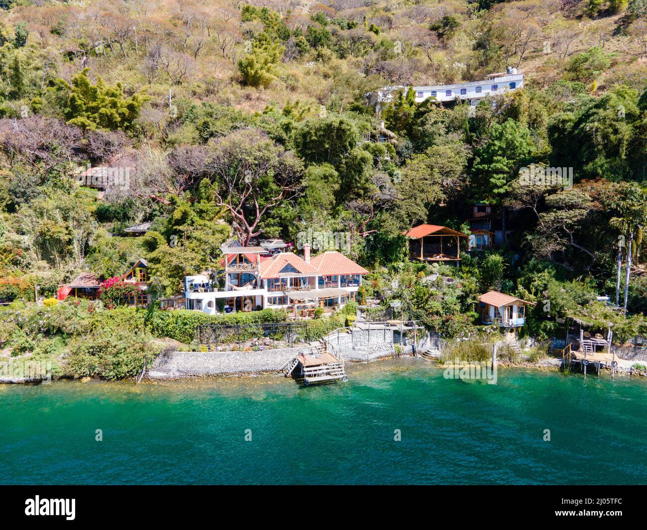 Aerial photograph of San Marcos la Laguna, Guatemala on a beautiful ...