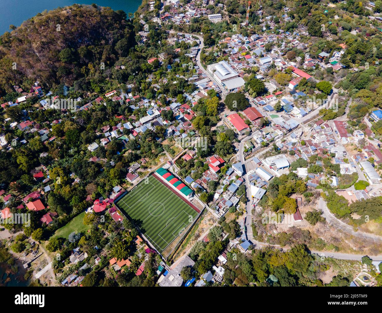 Aerial photograph of San Marcos la Laguna, Guatemala on a beautiful ...