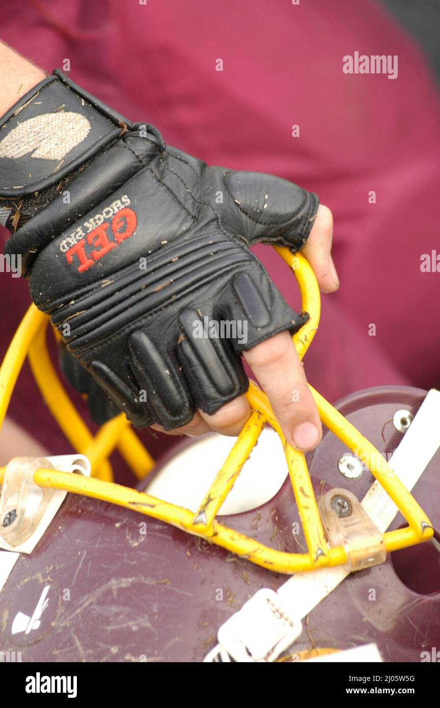 Parts of football game and hands and such of 11 and 12 year old players ...