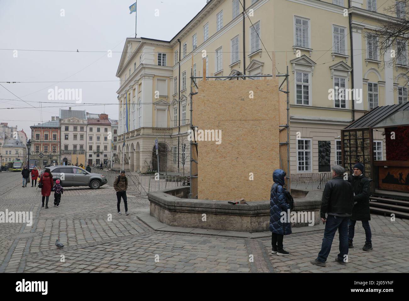 Lviv, Ukraine. 16th Mar, 2022. A statue, wrapped in plastic and ...