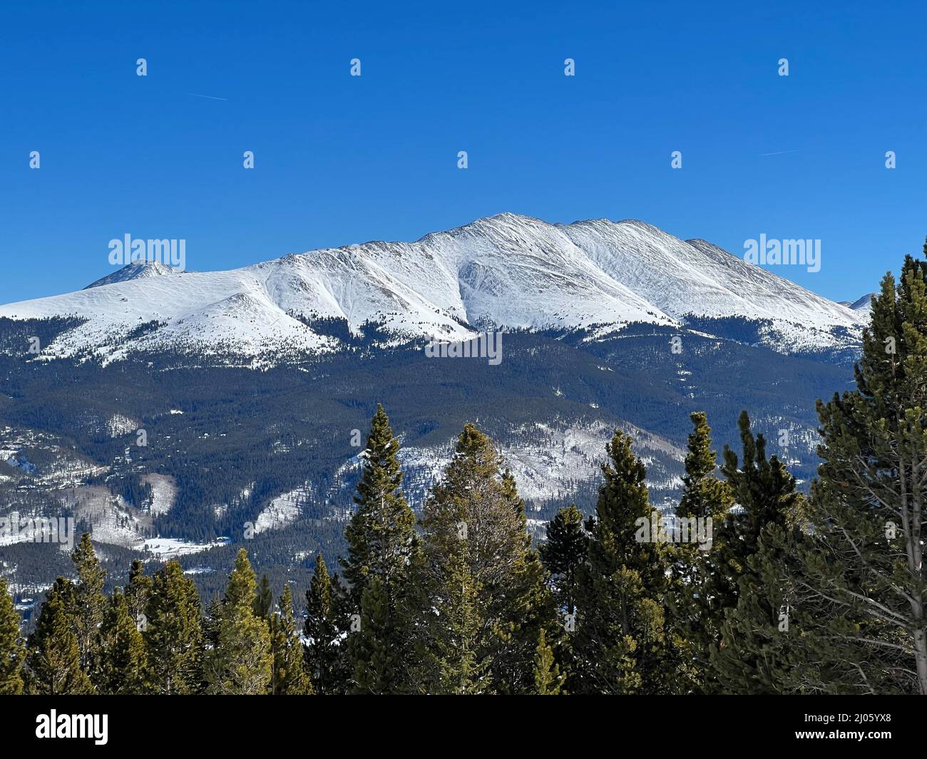Amazing winter landscape. Peaks covered with snow on a beautiful sunny ...