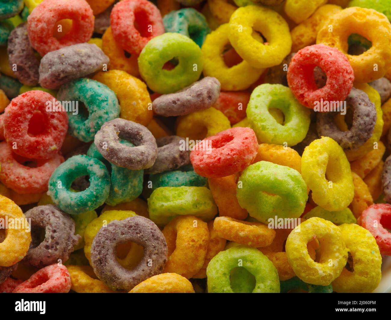 Macro shot. Rainbow fruit sweet rings. Crispy whole grain quick ...