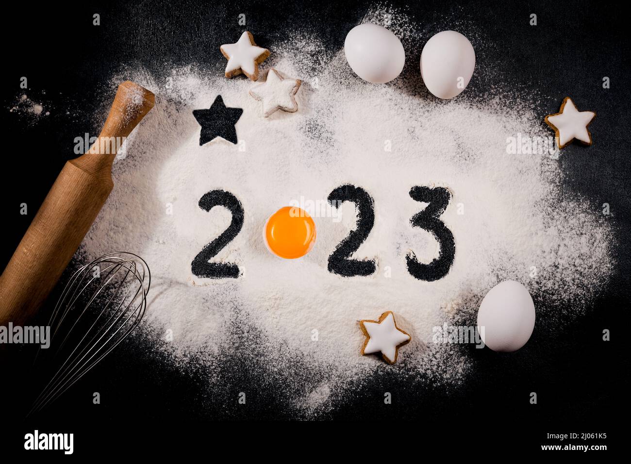 Creative Happy New Year 2023 greeting card for home baker. Numbers made ...