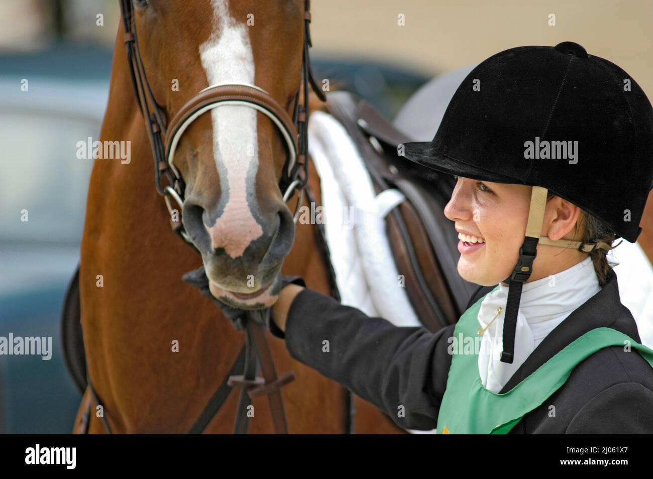 Girl riders and horses at Equestrian event Stock Photo - Alamy