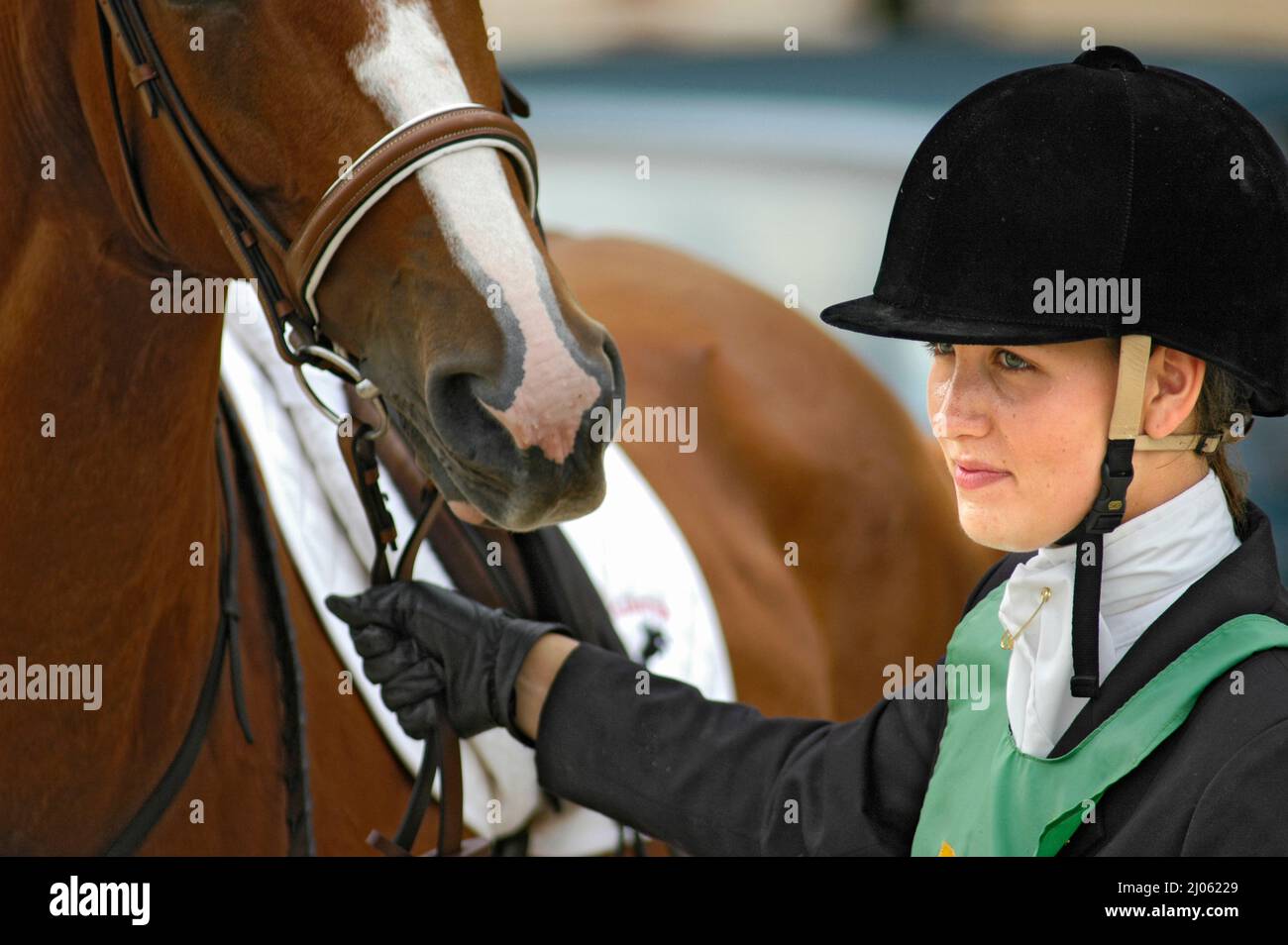 Girl riders and horses at Equestrian event Stock Photo - Alamy