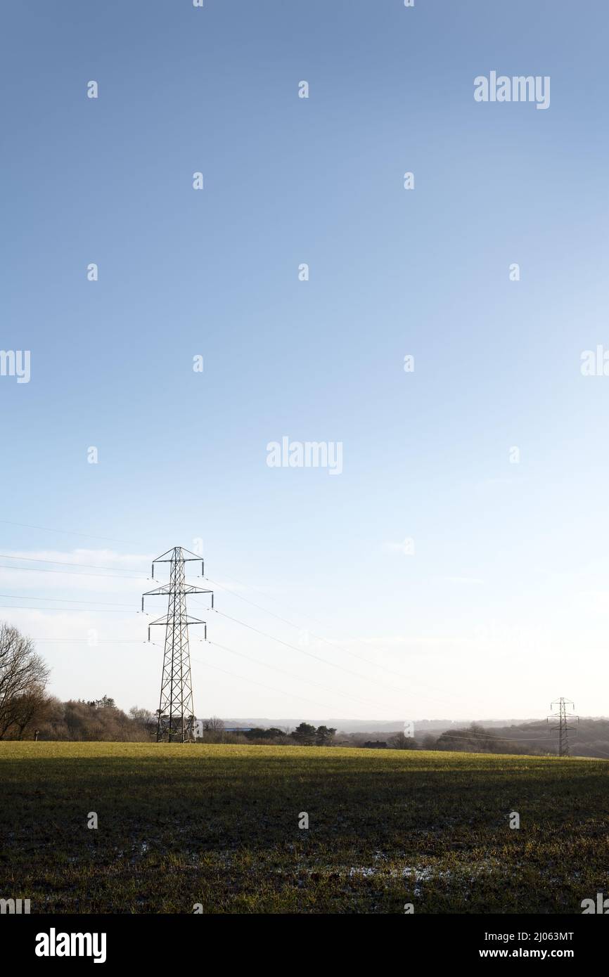Electric pylon in the countryside in winter in England Stock Photo - Alamy