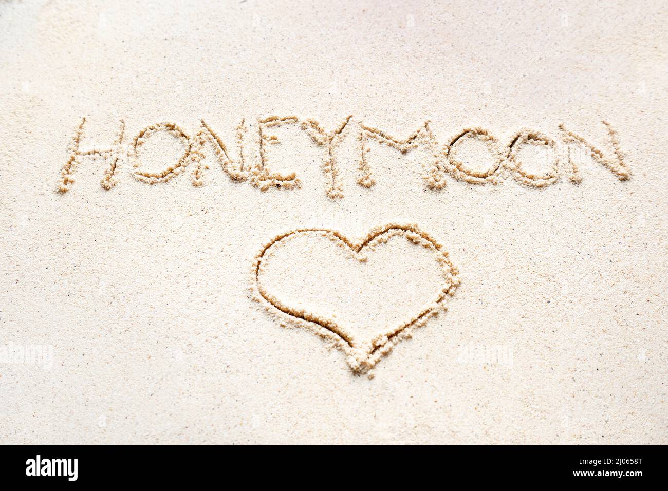 Honeymoon sand beach writing hi-res stock photography and images - Alamy