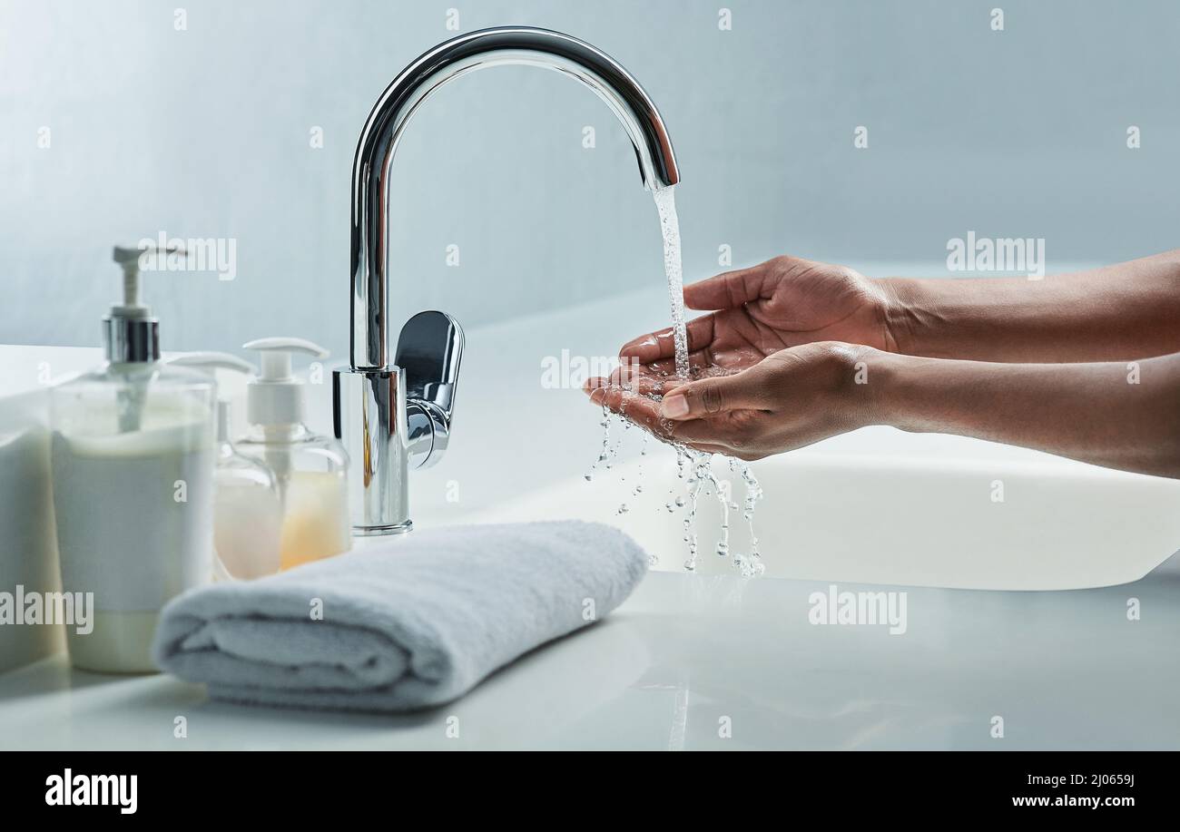 Germs and bacteria down the drain. Cropped shot of a man washing his ...