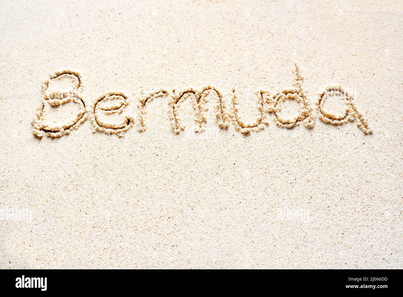 Handwriting words "Bermuda" on sand of beach Stock Photo - Alamy