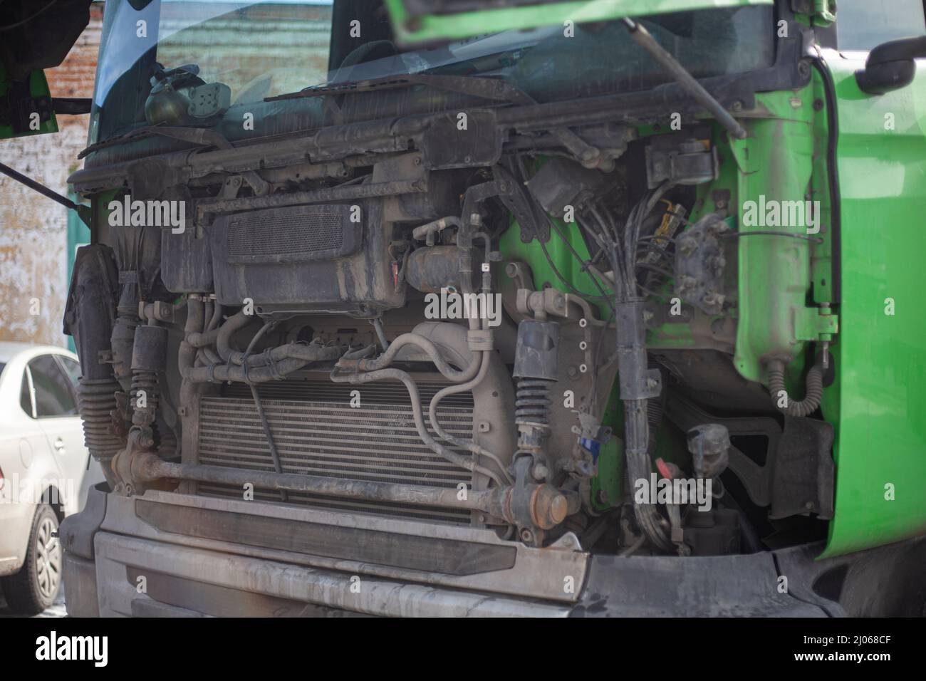 Truck engine repair on the street. A truck for transporting goods broke ...