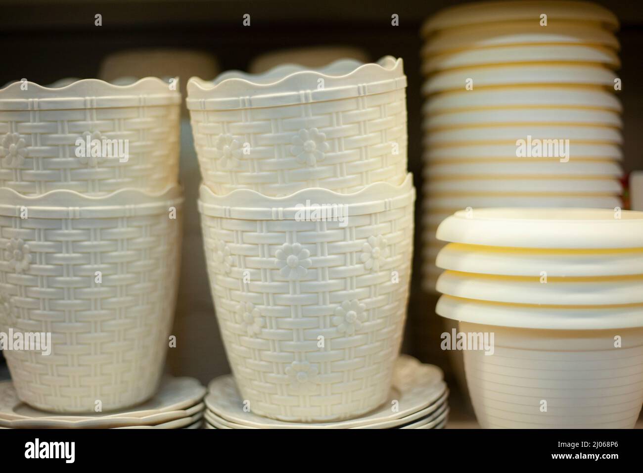 Pots for plants. Garden pots stand in stack on counter. Details of ...