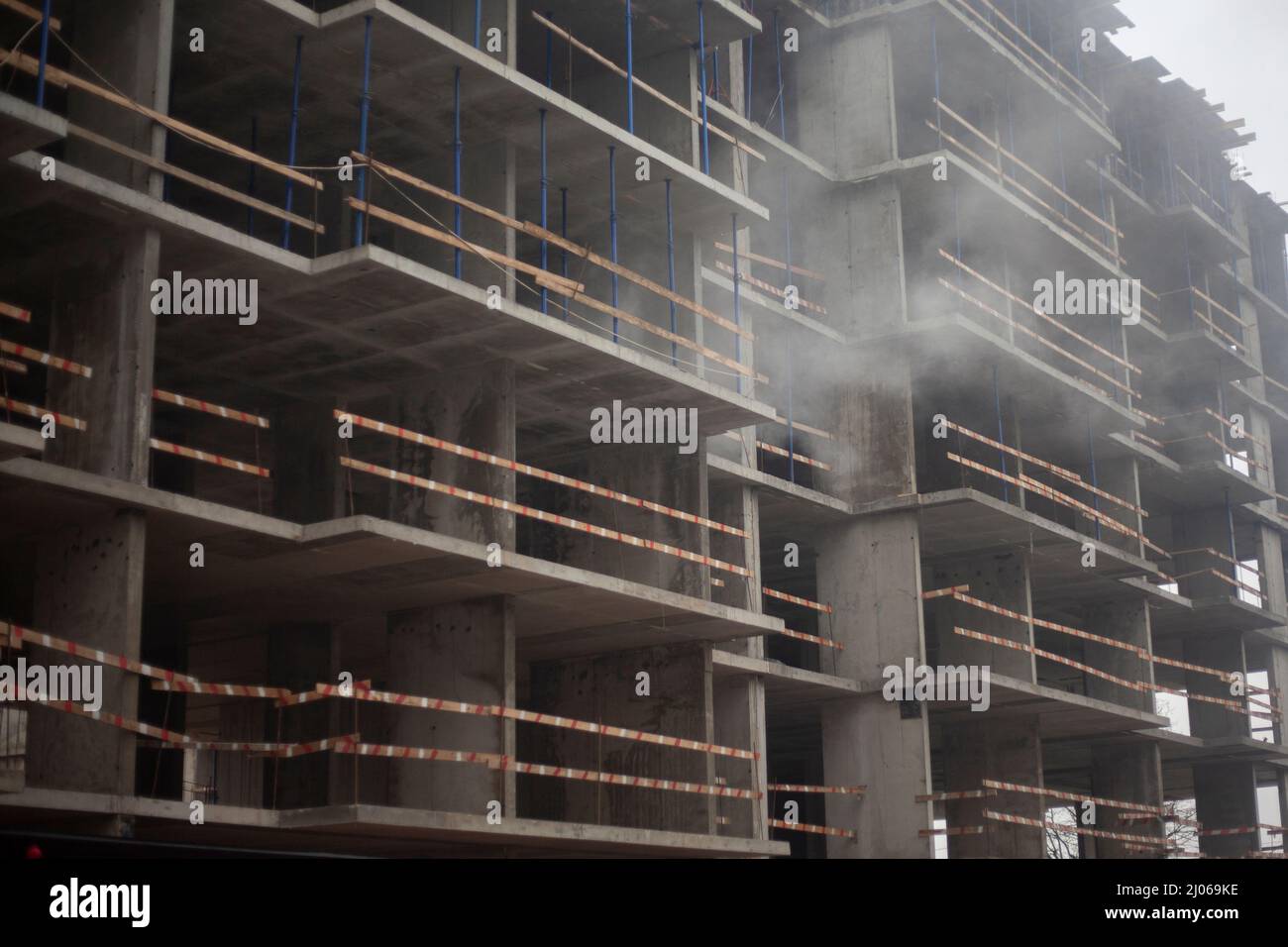 Construction of a new building and dust from the construction site ...