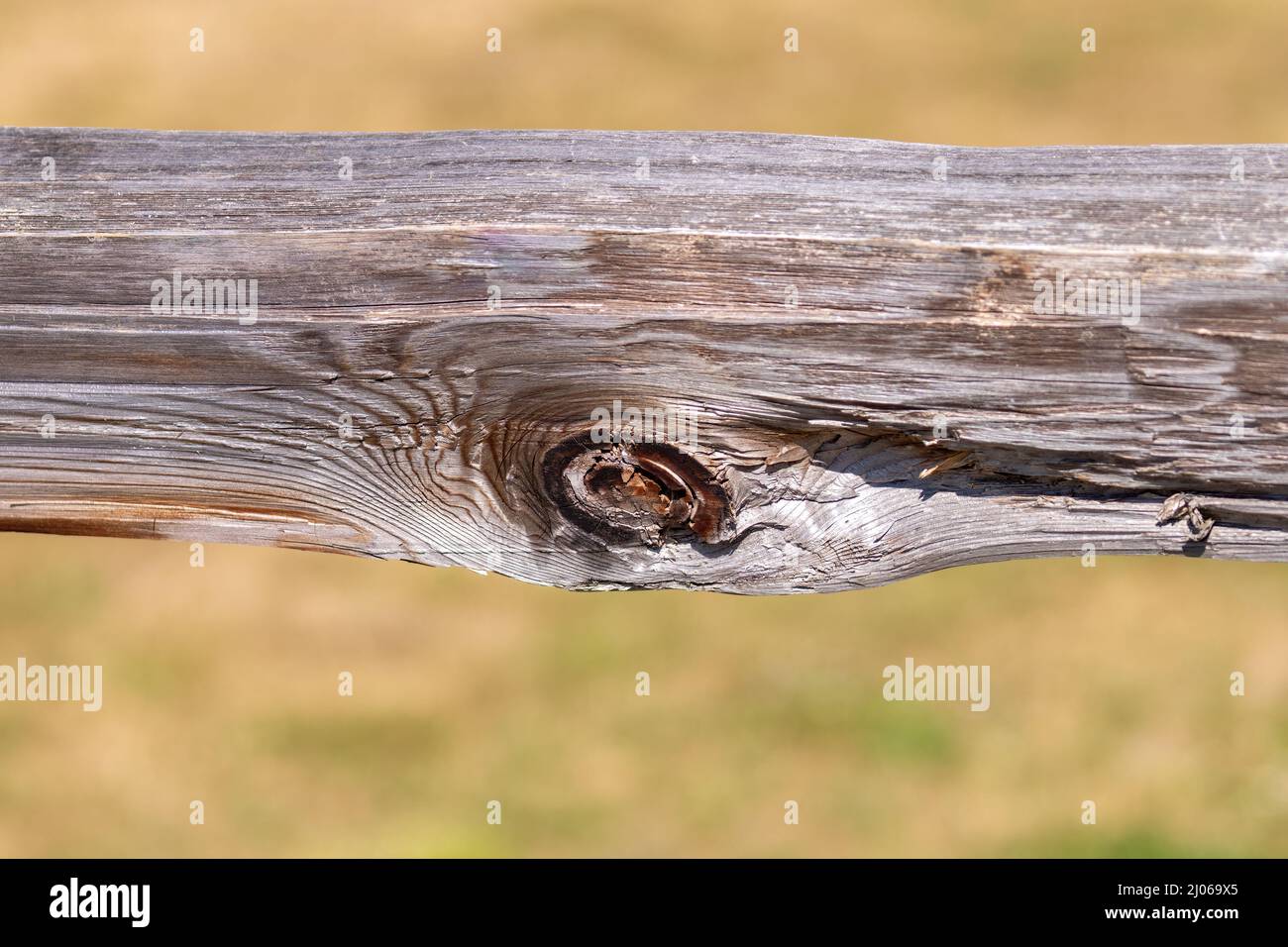 wooden beam of fence near field Stock Photo - Alamy