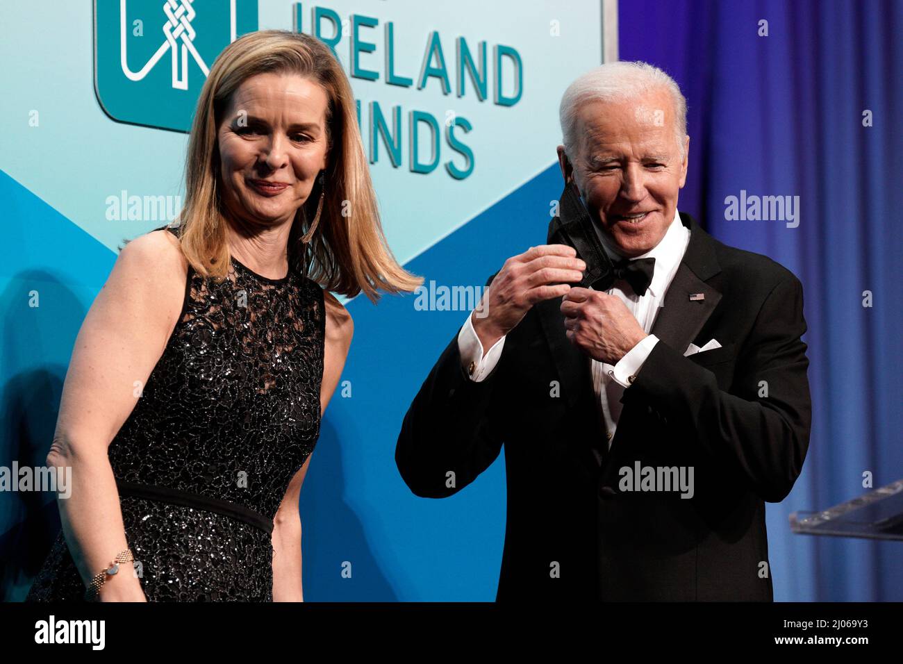 U.S. President Joe Biden is greeted by CEO Caitriona Fottrell at The ...
