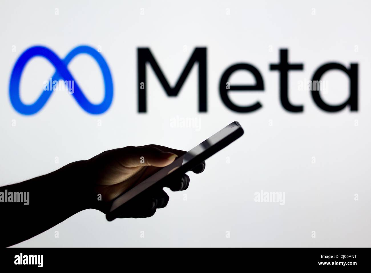 In this photo illustration the Meta Platforms logo seen in the ...