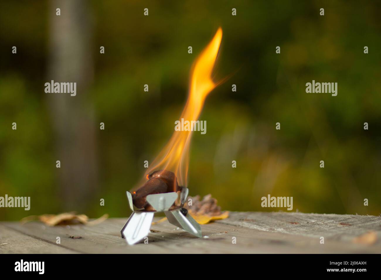 Flames from alcohol. Burning dry alcohol. Object for heating substances ...
