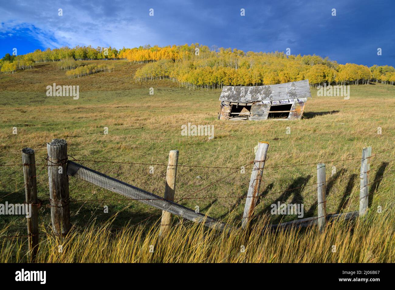 An autumn rural country Canadian landscape of an old farm house and ...