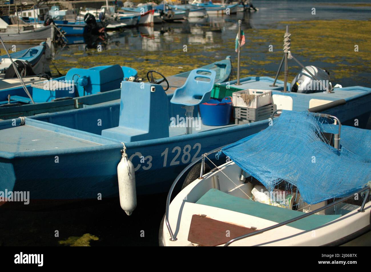 Boats Anchored at Seaside Dock Stock Photo - Alamy