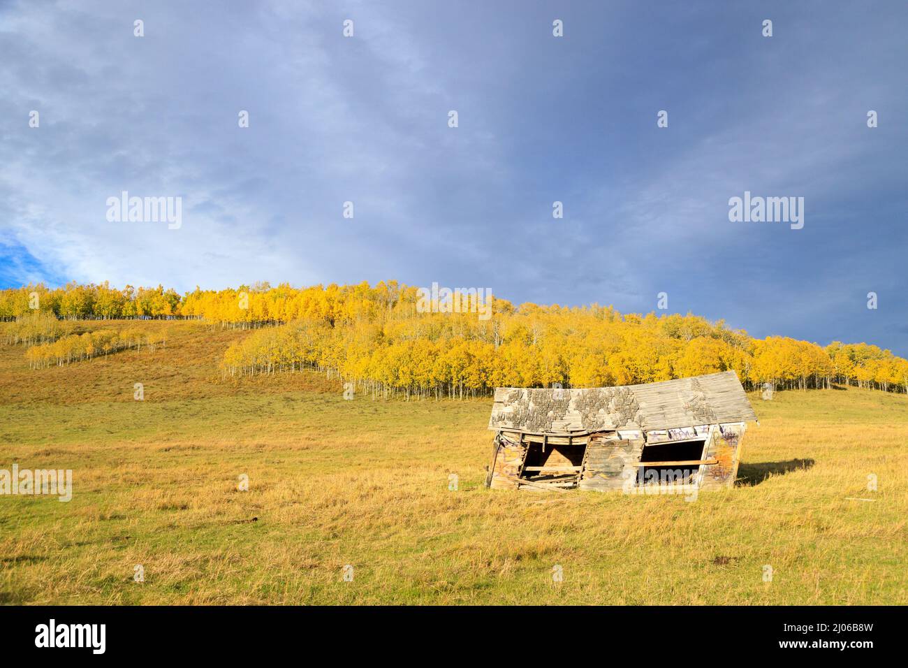 An autumn rural country Canadian landscape of an old farm house and ...