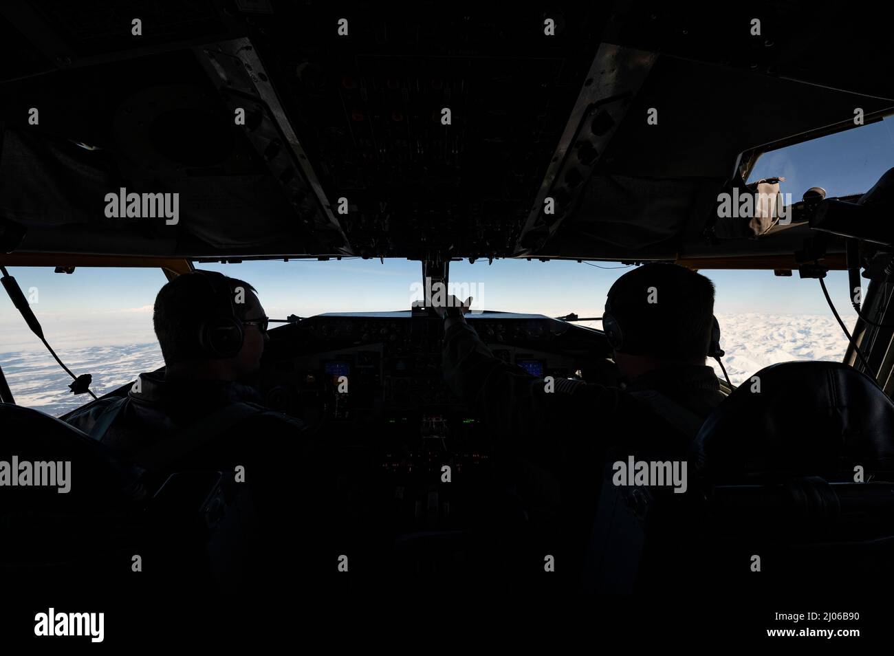 U.S. Air Force 1st Lt. Seth Nanny (left), a pilot assigned to the 97th ...