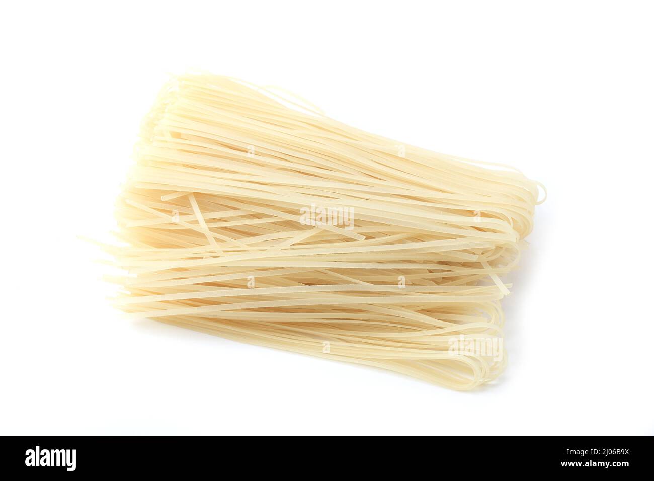 Raw dry rice noodles on white background Stock Photo - Alamy