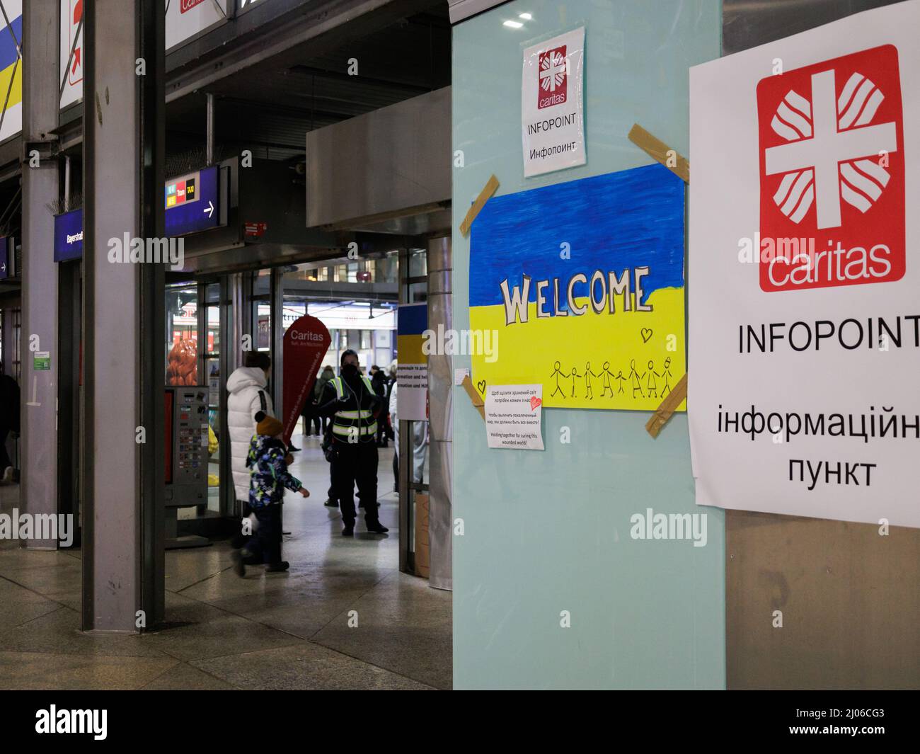 A hand-made welcome sign is on display for arriving Ukrainian refugees ...
