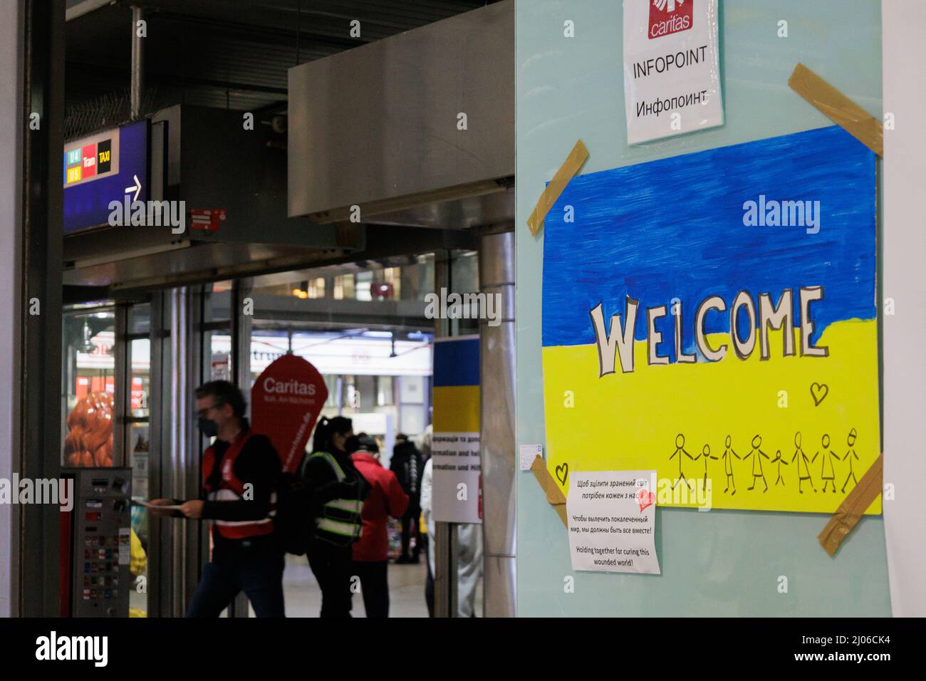 A hand-made welcome sign is on display for arriving Ukrainian refugees ...