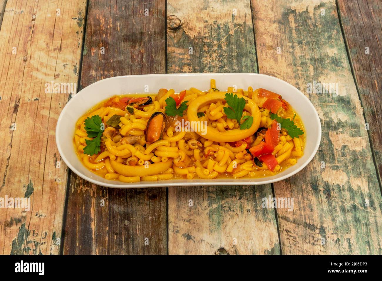 The traditional fideuá is like the classic rice in paella, but with the ...