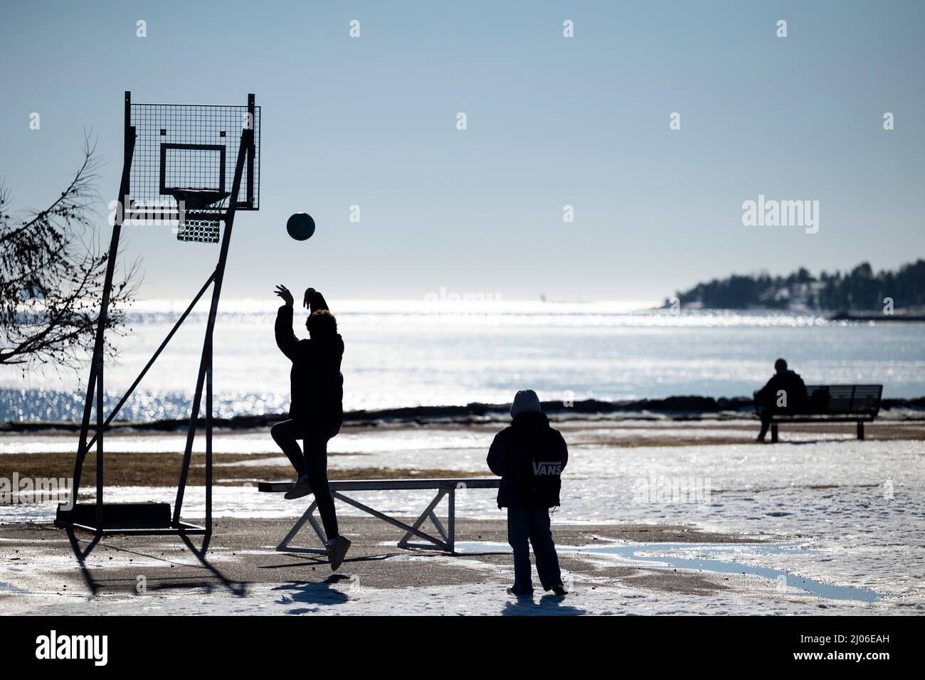 Helsinki, Finland. 16th Mar, 2022. People play basketball in ...